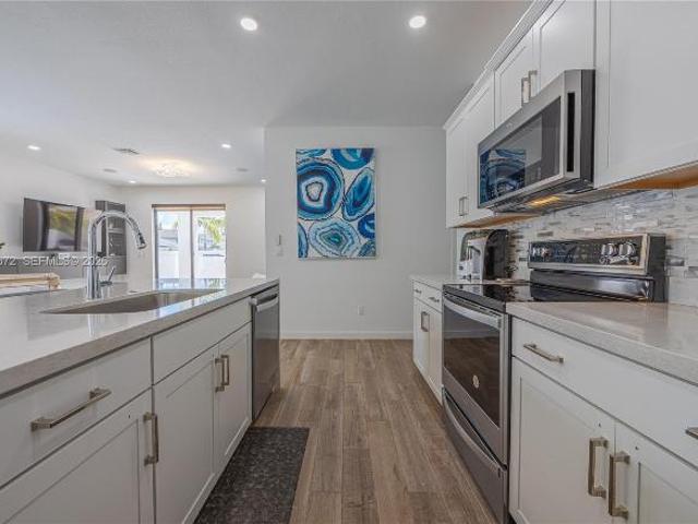 4 Br, 3 bath, Single Family 7126 Rockwood Road