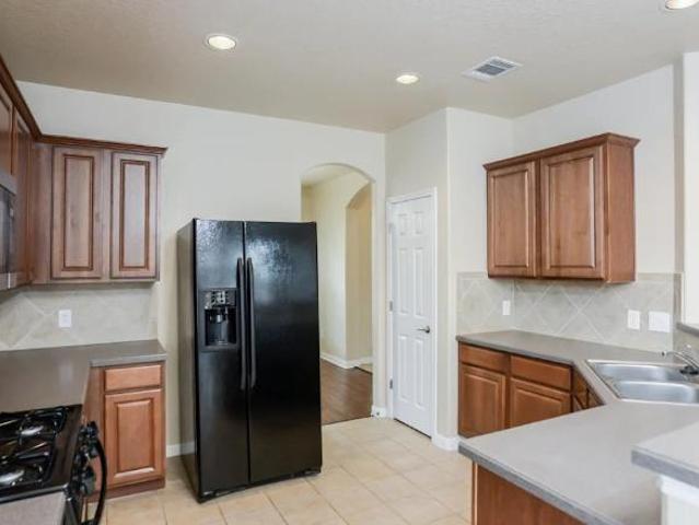 4 Br, 3 bath, Single Family 8410 Western Way