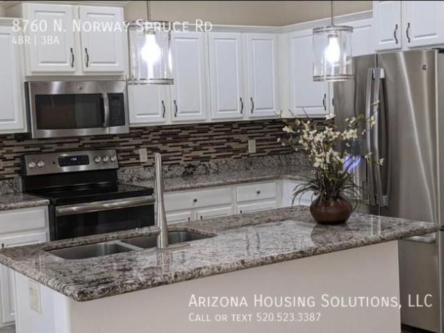 4 Br, 3 bath, Single Family 8760 N Norway Spruce Rd