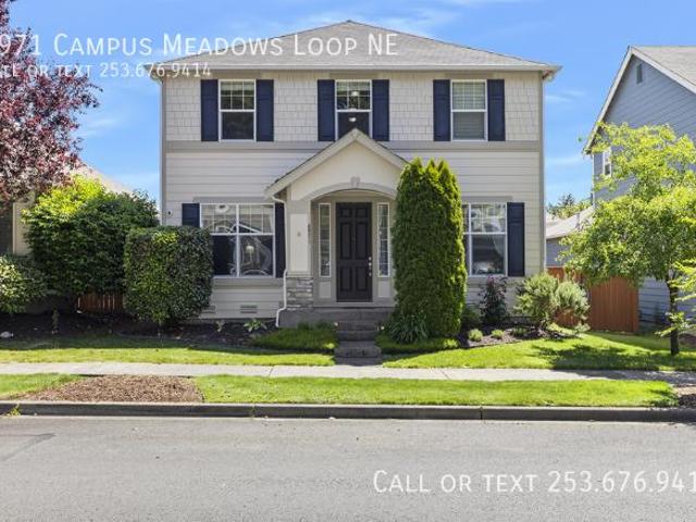 4 Br, 3 bath, Single Family 8971 Campus Meadows Loop NE