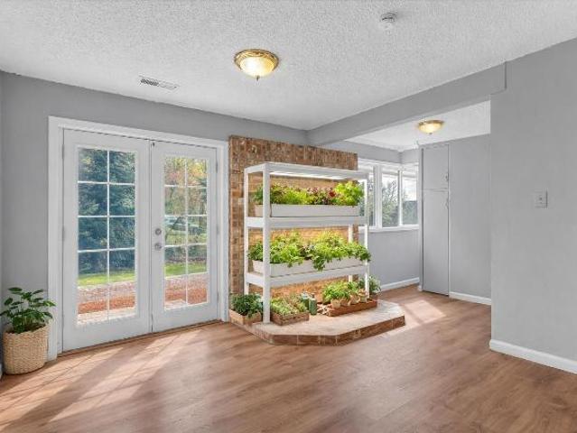 4 Br, 3 bath, Single Family 9660 NW BERMAR LN