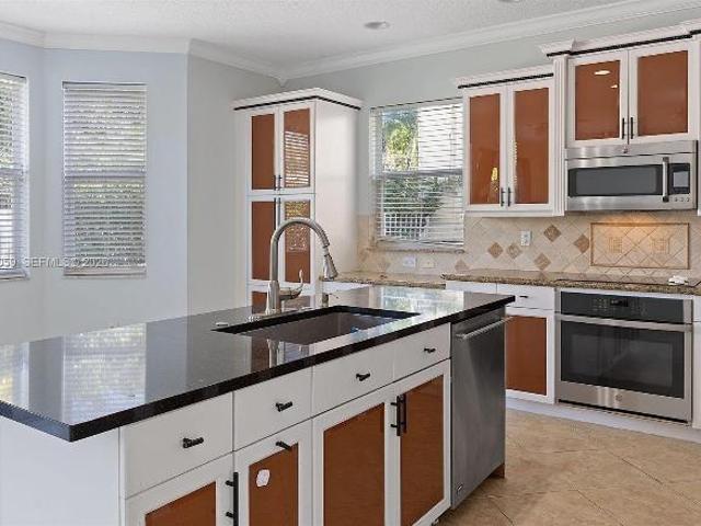 4 Br, 3 bath, Single Family 9869 Woodworth Court