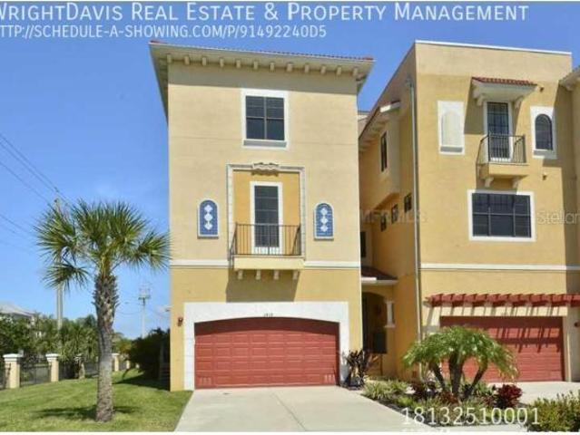 4 Br, 4 bath, Townhouse/Brownstone/RowHouse 6404 Margarita Shores Ln