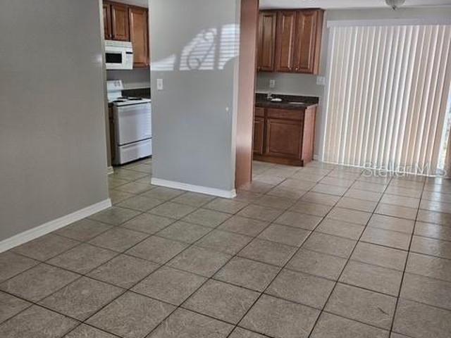 5024 S 85th St, Tampa, FL 33619 | MLS #TB8496 | Compass