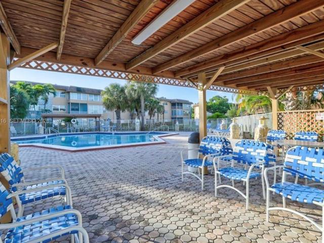 5031 W Oakland Park Blvd, Unit 103, Lauderdale Lakes, FL 33313 | MLS #A12012 | Compass
