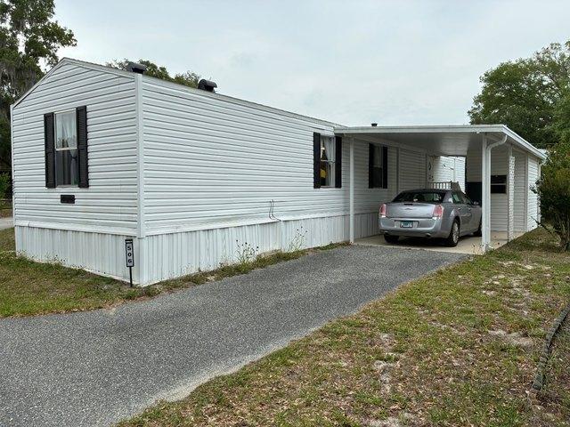 506 Palm Ter, Lady Lake, FL 32159