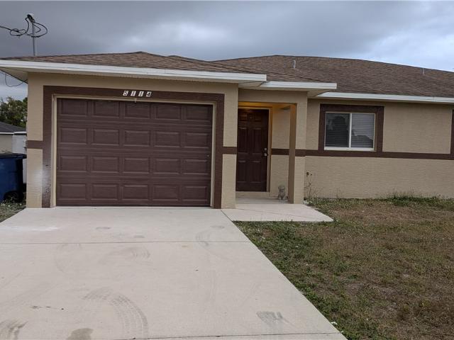 5114 27th St SW, Lehigh Acres, FL 33973 | MLS #2026002 | Compass