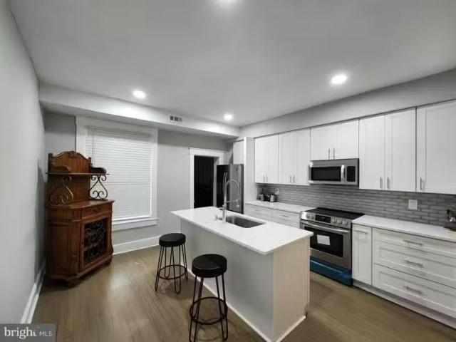 513 N LINWOOD AVE, BALTIMORE, MD 21205 Single Family Residence.