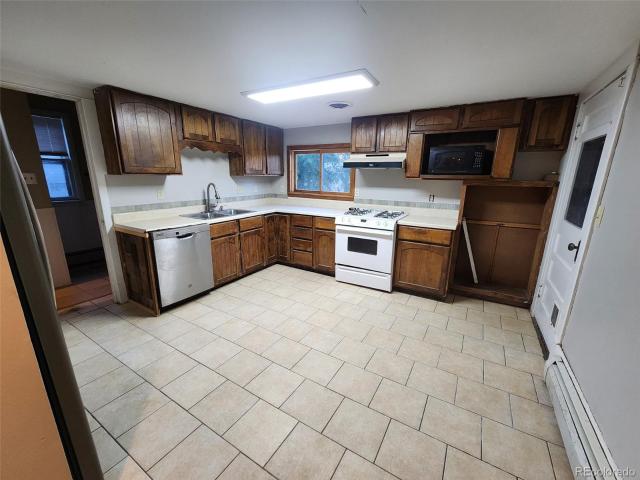 518 N 4th St, Sterling, CO 80751 | MLS #6701 | Compass