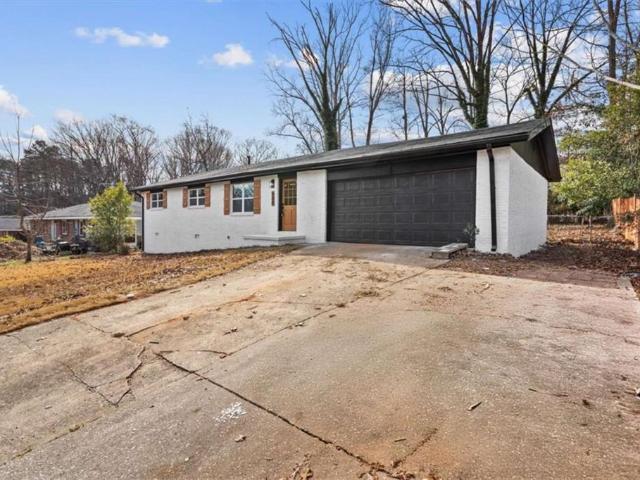 520 Stonewood Dr, Stone Mountain, GA 30087 | MLS #7758 | Compass