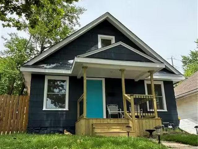 5214 SAIDA AVE, KANSAS CITY, MO 64123 Single Family Residence.