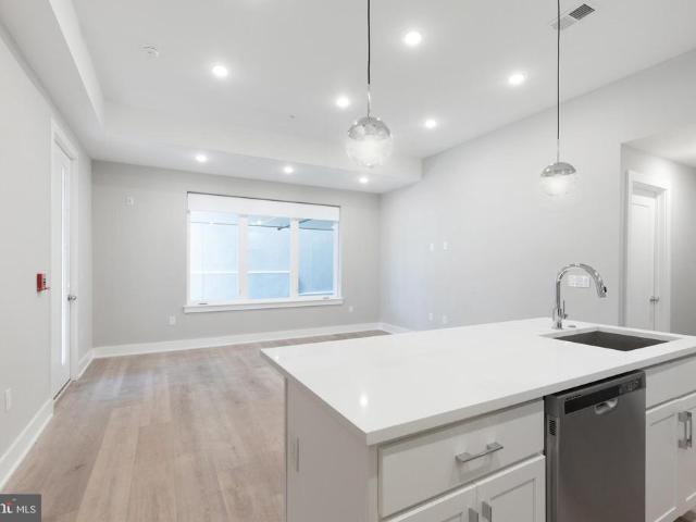 52 W Washington Lane # 100