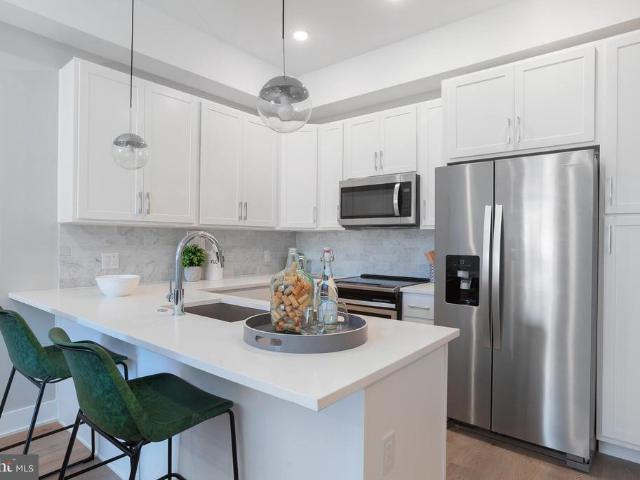 52 W Washington Lane # 203