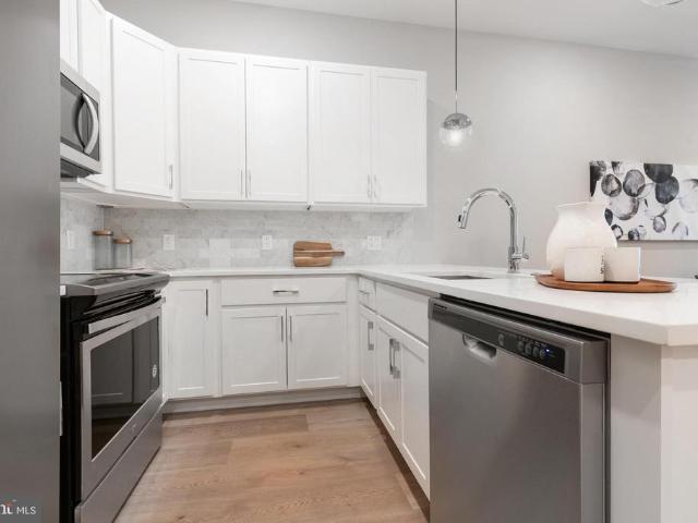52 W Washington Lane # 204