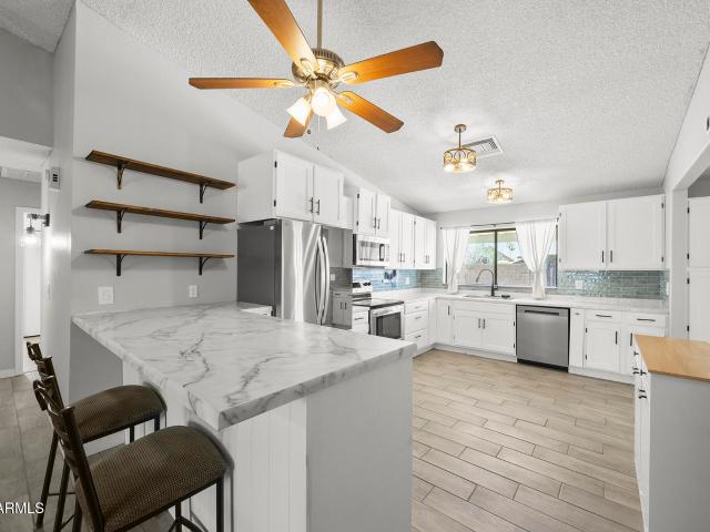5301 W ASTER Drive