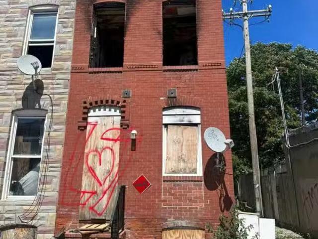 535 S BENTALOU ST, BALTIMORE, MD 21223 Single Family Residence.