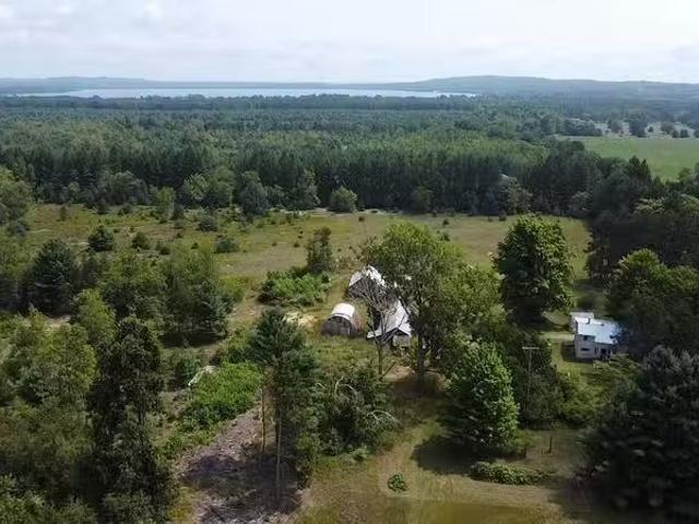 5420 ERICKSON RD, BEAR LAKE, MI 49614 Single Family Residence.