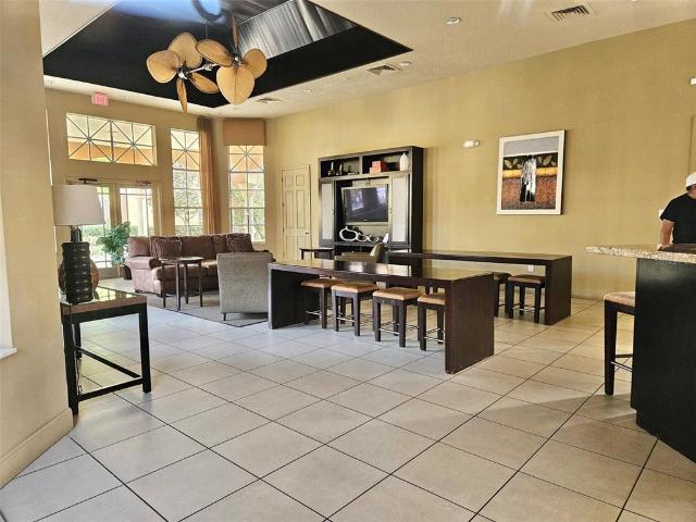 5542 Metrowest Blvd, Unit 104, Orlando, FL 32811 | MLS #O6385