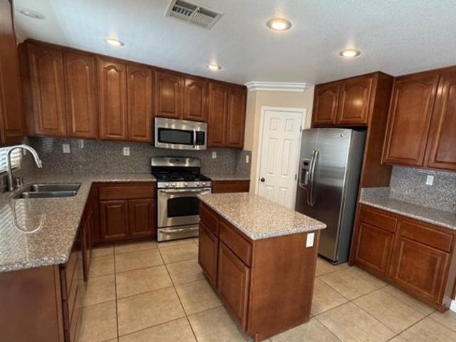 5565 Golden Palms Court