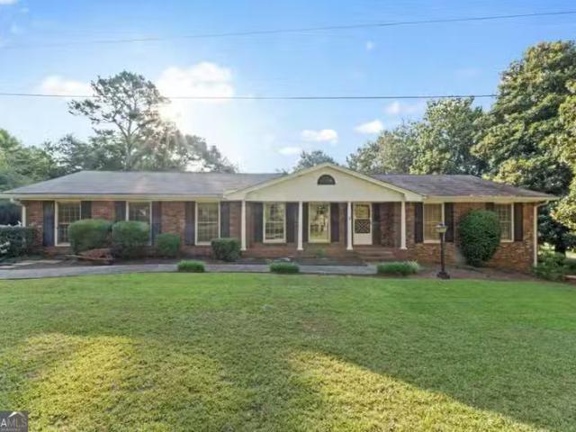 558 OAK GROVE RD, MCDONOUGH, GA 30253 Single Family Residence.