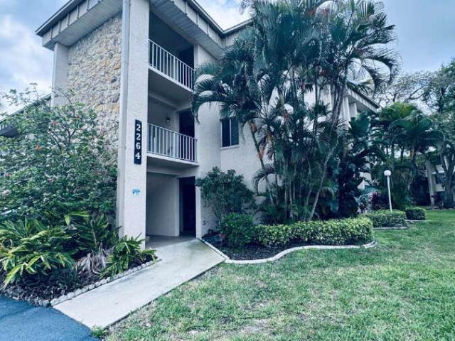 Updated 2 bedroom home in a 55+ Fort Myers community with tile flooring throughout and access to community amenities
