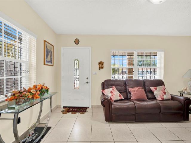 560 NW 57th Ct, Miami, FL 33126 | Compass