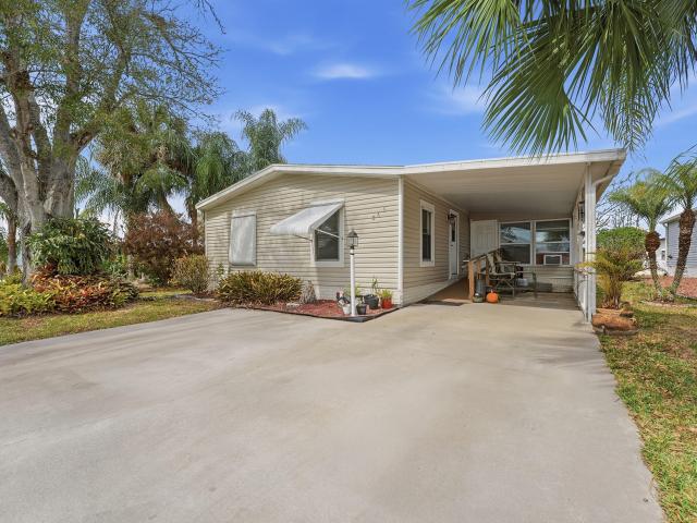 566 Dolphin Cir, Barefoot Bay, FL 32976 | MLS #R11167 | Compass