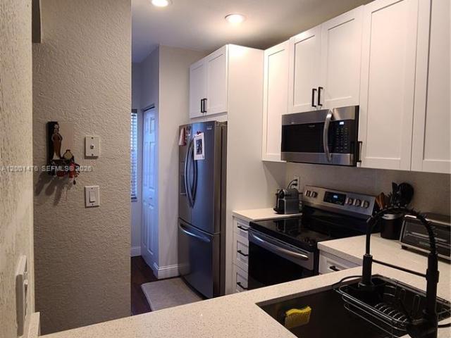 5791 NW 116th Ave, Unit 105, Doral, FL 33178 | MLS #A12001 | Compass