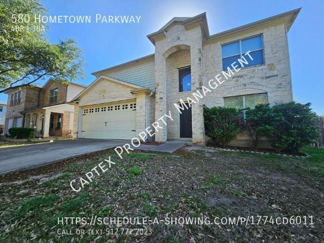 580 Hometown Parkway, 4 beds, 2 full and 1 half baths