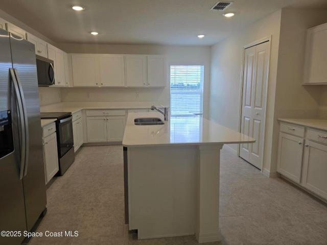 581 SW Richmond Cir, Palm Bay, FL 32908 | MLS #1058 | Compass