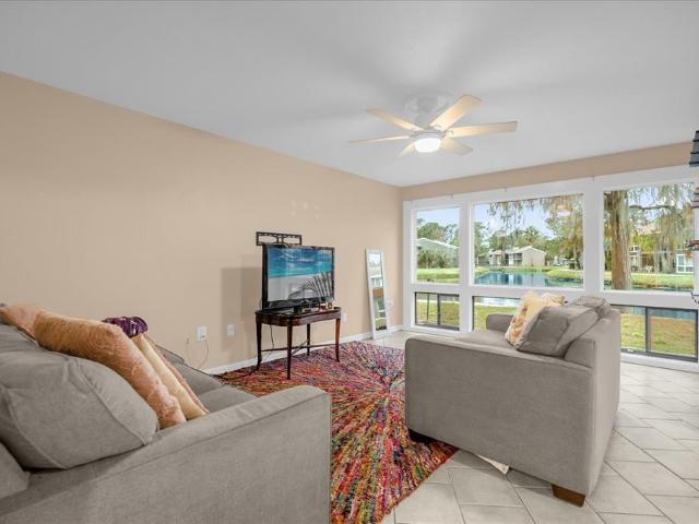 5842 Peregrine Ave, Unit C01, Orlando, FL 32819 | MLS #O6386