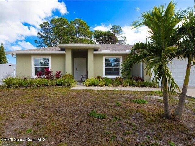 587 Plumbago Rd NW, Palm Bay, FL 32907