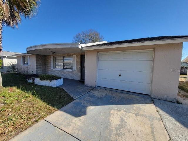5912 Della Dr, Holiday, FL 34690 | MLS #W7883 | Compass