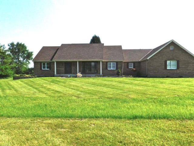 5 acres and a Large 6 bedroom house. Extra garages and sheds