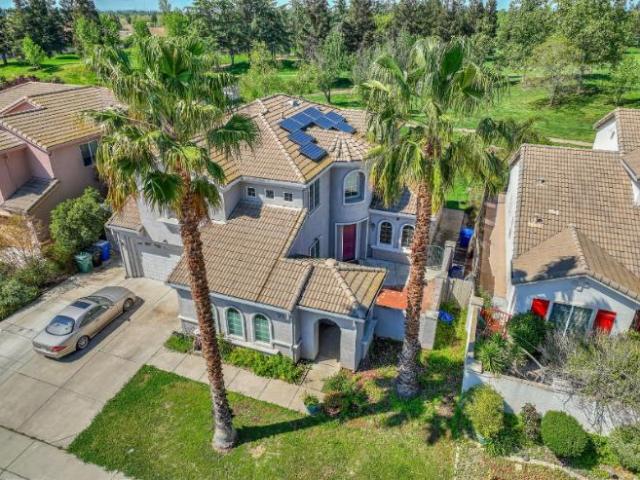 5 Br, 3 bath, Single Family 7820 Tigerwoods Dr
