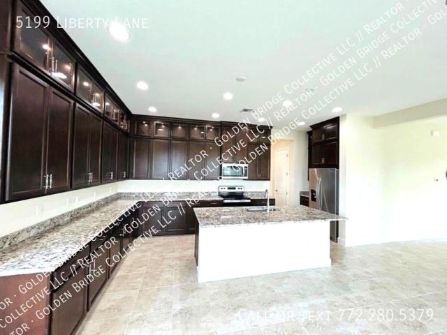5 BR, 4.5 BA Apartment 5199 Liberty Lane, Westlake, FL 33470