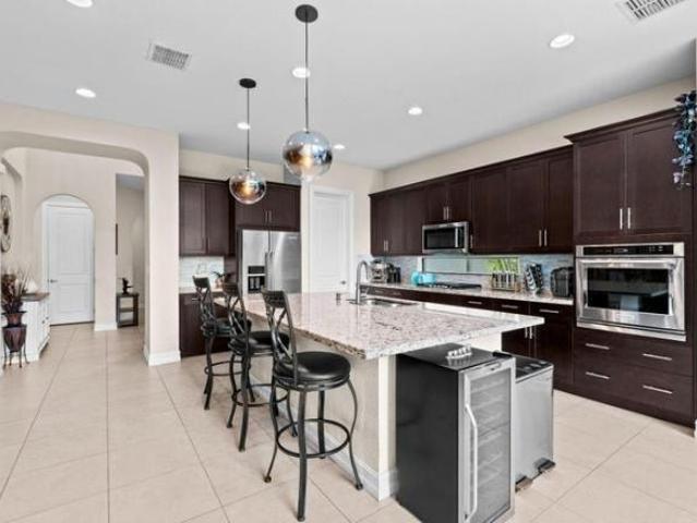 5 Br, 6 bath, Single Family 8845 Watercrest Circle W