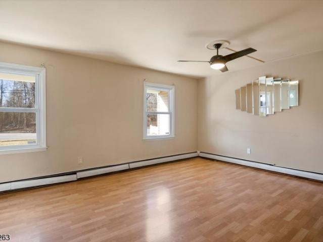 63 W William St