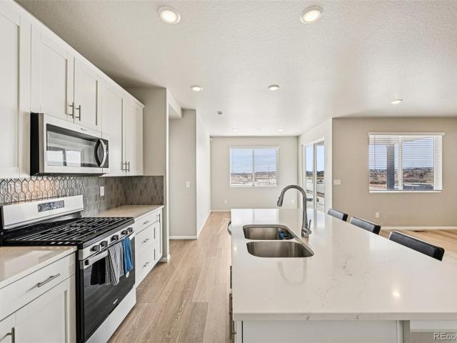 6002 Hourglass Dr, Brighton, CO 80601 | MLS #3033