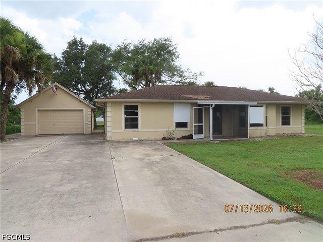 602 Harrison Dr, Lehigh Acres, FL 33936