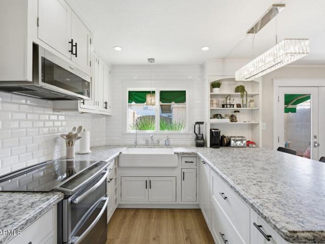 6051 n granite reef road