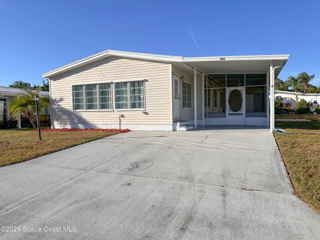 606 Dolphin Cir, Barefoot Bay, FL 32976 | MLS #1068