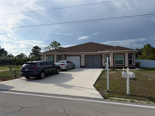 610 W 12th St, Lehigh Acres, FL 33972
