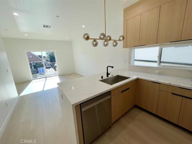 611 W 41st Pl, Unit 1/2, Los Angeles, CA 90037 | MLS #OC25262 | Compass