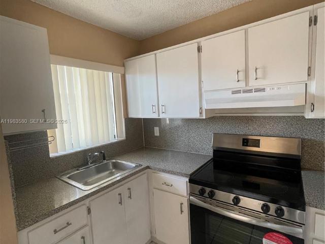 6121 W 24th Ave, Unit 206, Hialeah, FL 33016 | MLS #A11983 | Compass