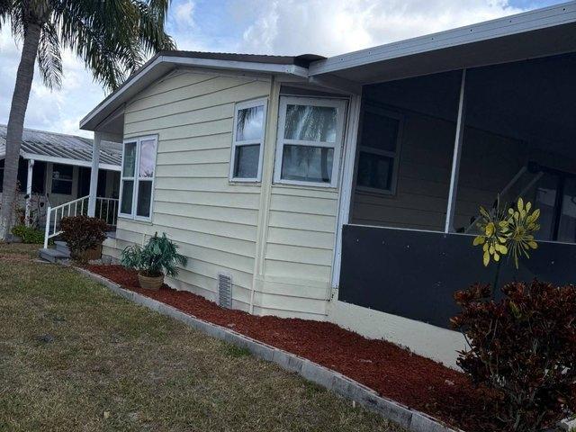 6122 Palm Breezes Dr, Lantana, FL 33462