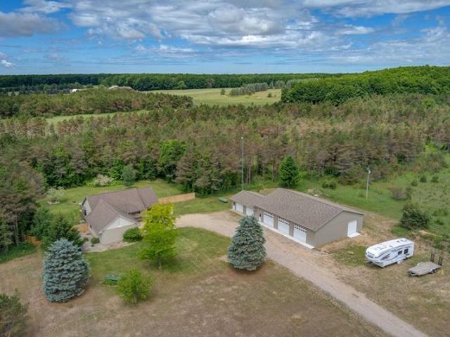 6151 Smith Rd, Rapid City, MI 49676