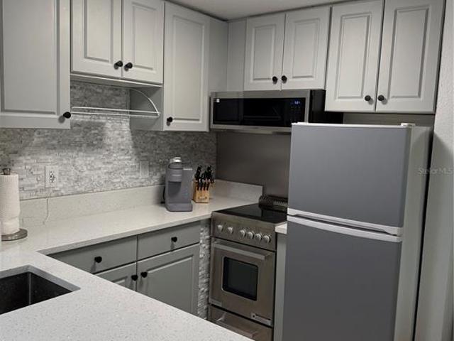 6165 Carrier Dr, Unit 3106, Orlando, FL 32819 | MLS #O6403