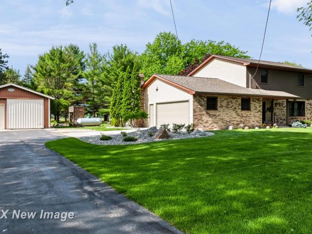 6180 W Freeland Road