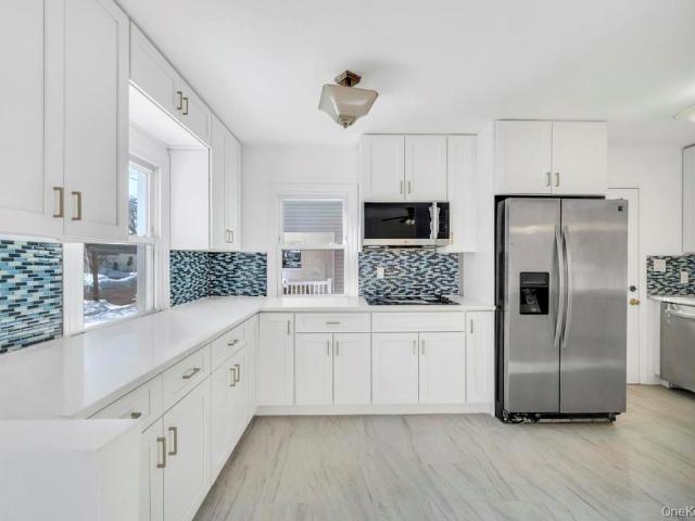 627 10th Ave, New Hyde Park, NY 11040 | MLS #995825 | Compass